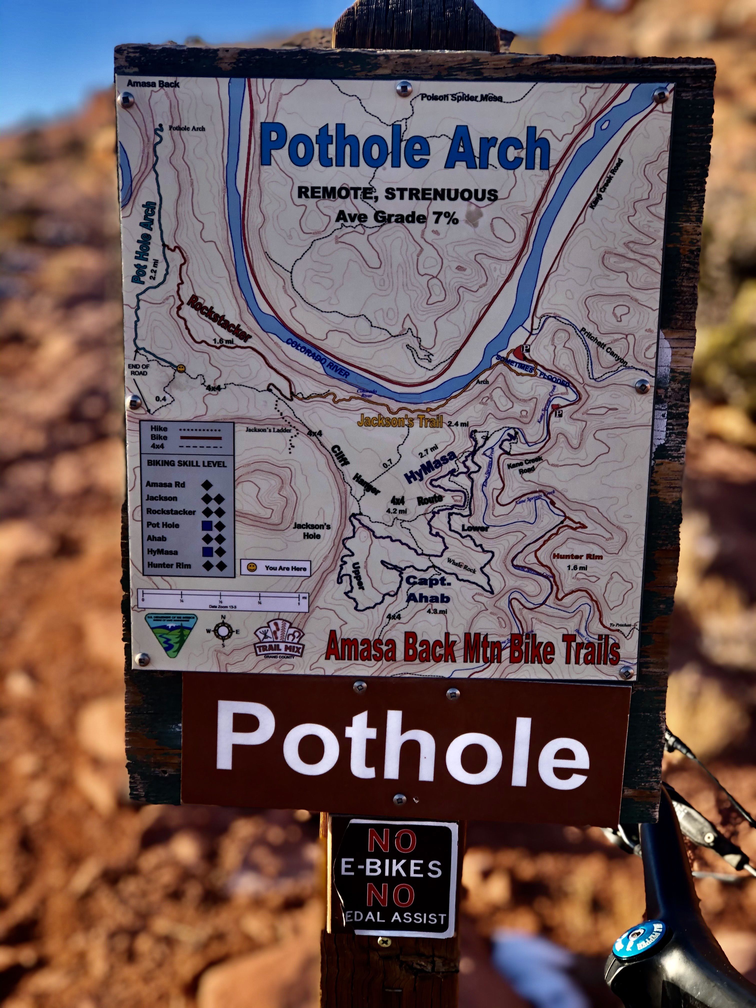 Blog > Trails > Pothole Arch | MTB Trails - Moab Bike Shuttle | Moab, Utah